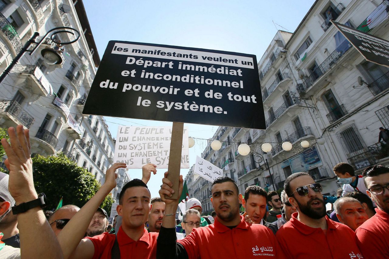 Algerians march against president and political system