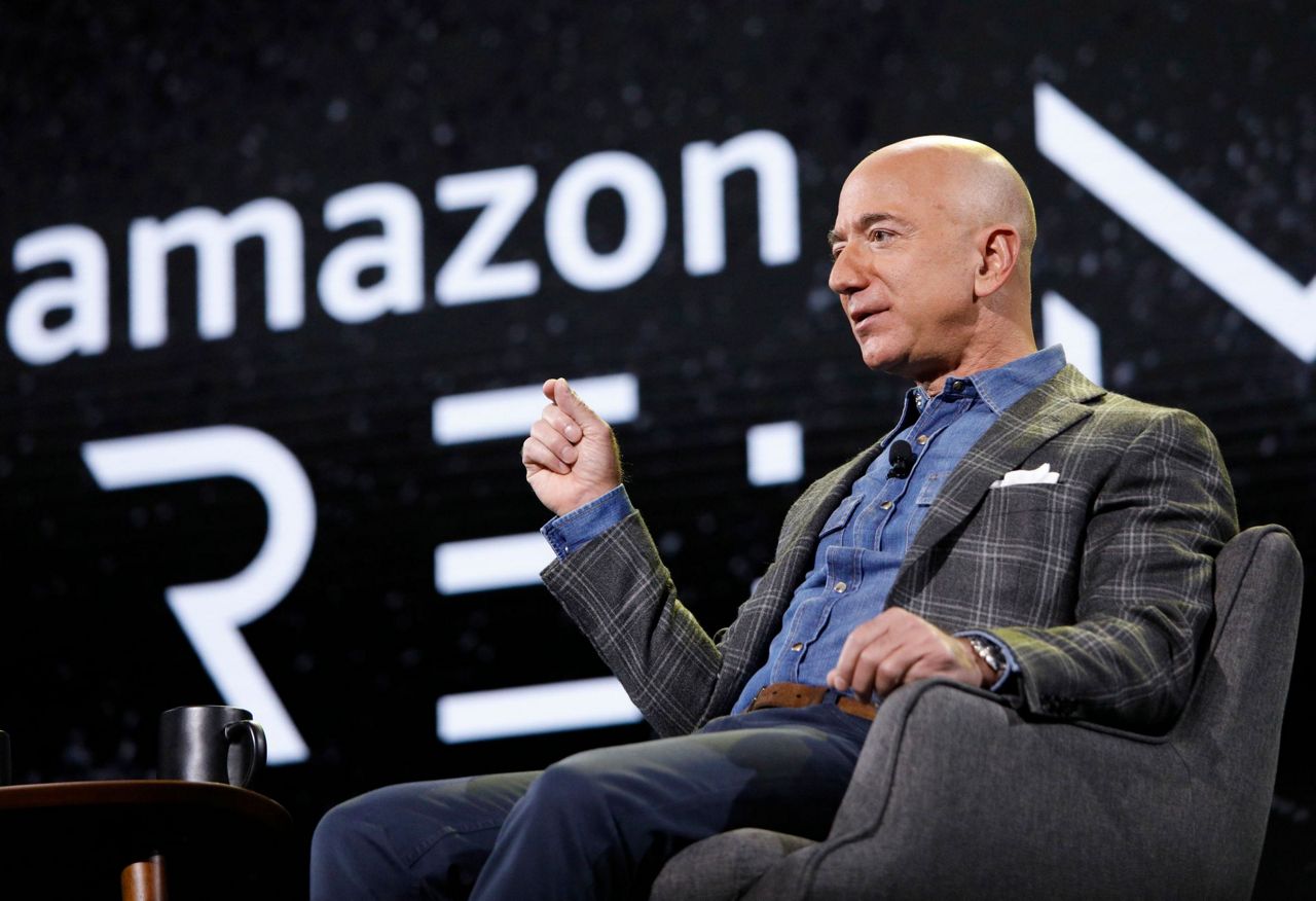 Amazon's Jeff Bezos interrupted by protester on Vegas stage