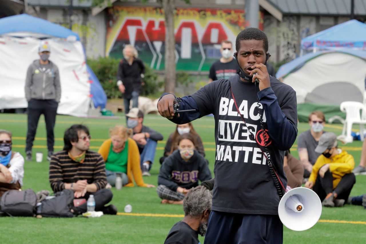 Shooting in Seattle protest zone leaves 1 dead, 1 injured