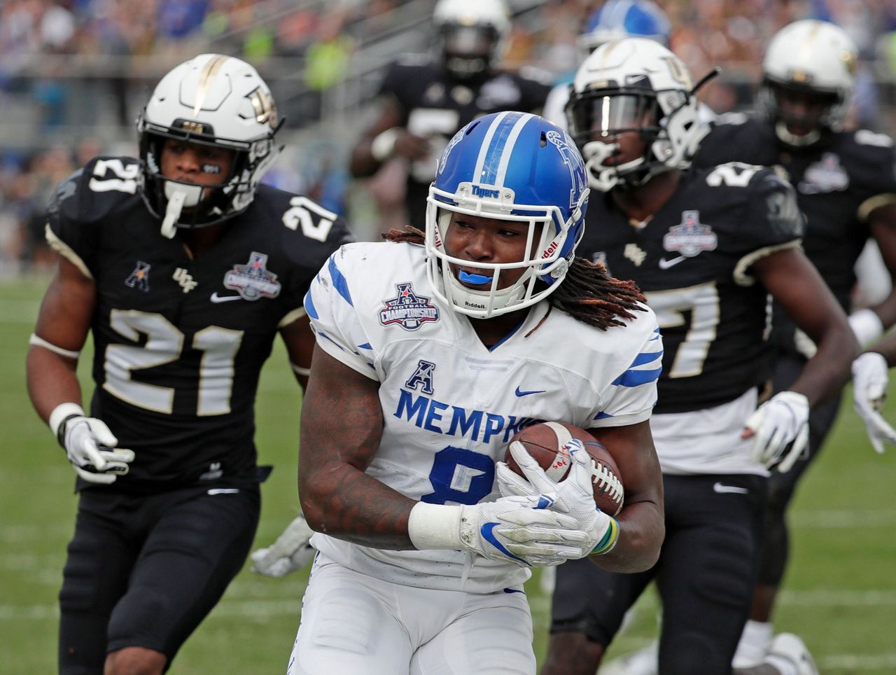 Mack shines, No. 7 UCF beats Memphis 56-41 for AAC title