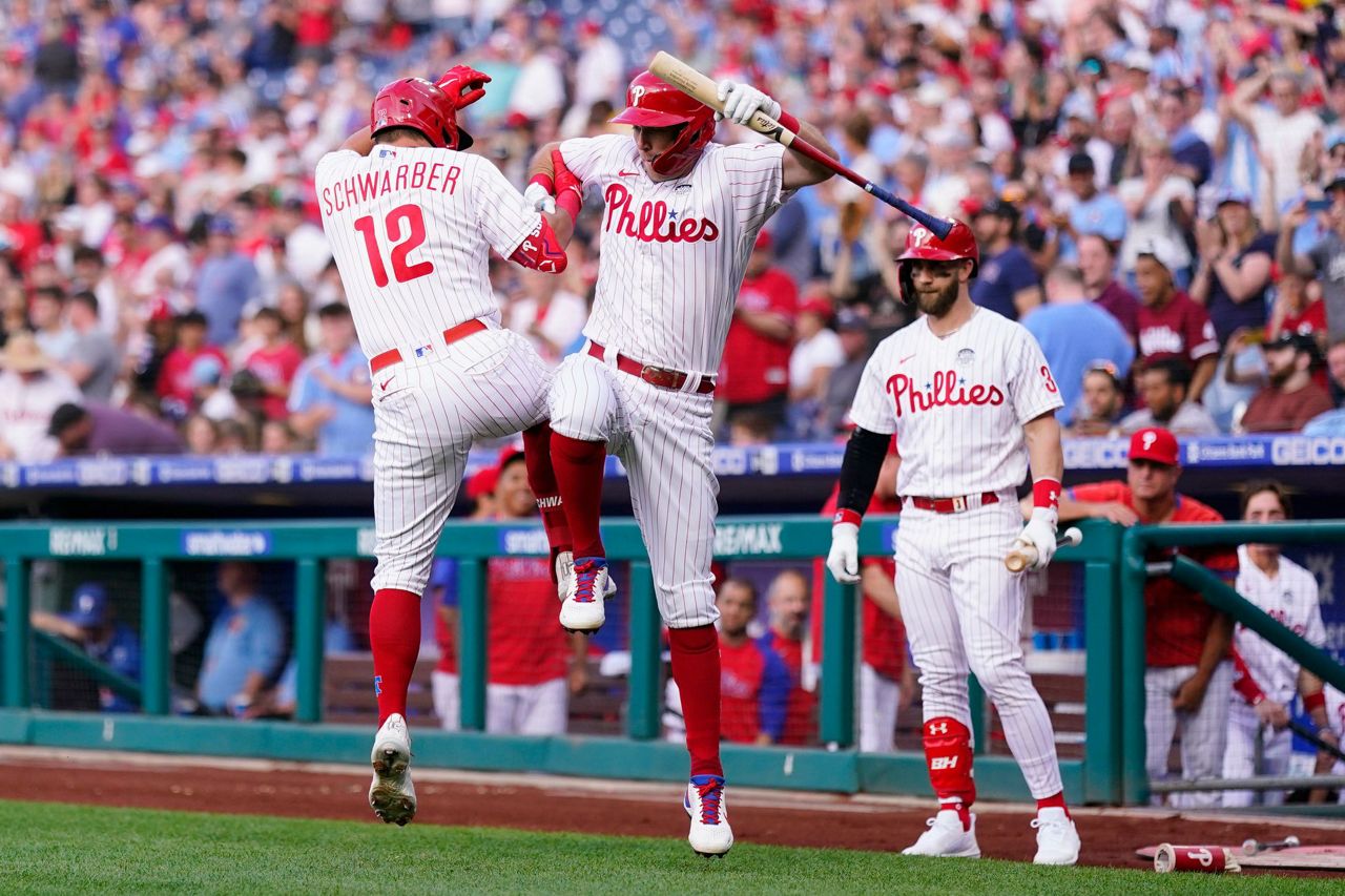 Harper, Schwarber 2 HRs, Thomson wins debut, Phils top Halos