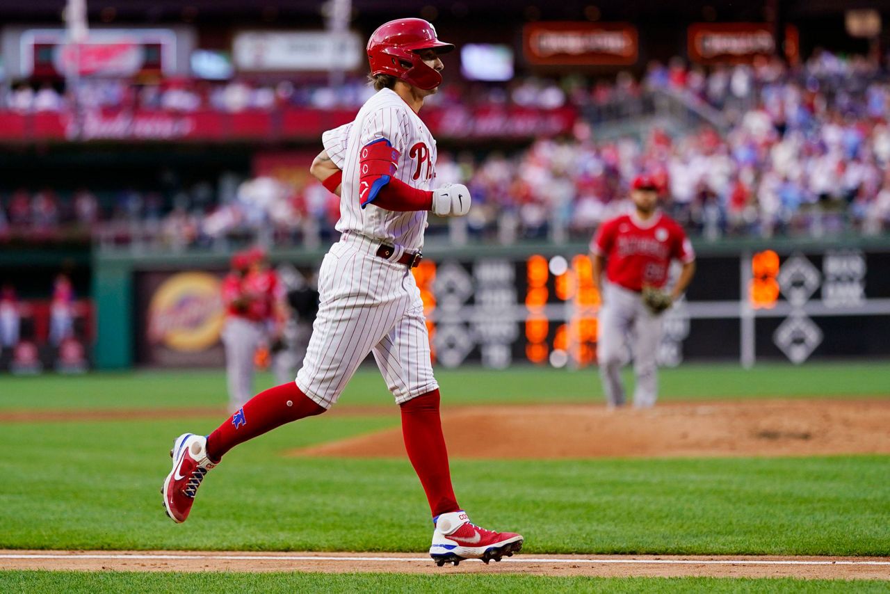 Harper, Schwarber 2 HRs, Thomson wins debut, Phils top Halos