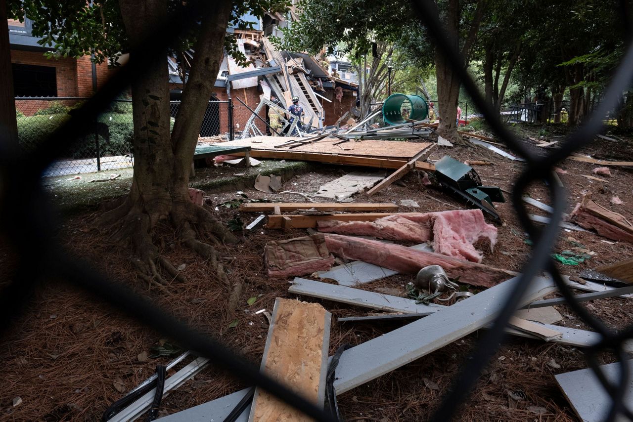 Explosion collapses part of apartment building near Atlanta