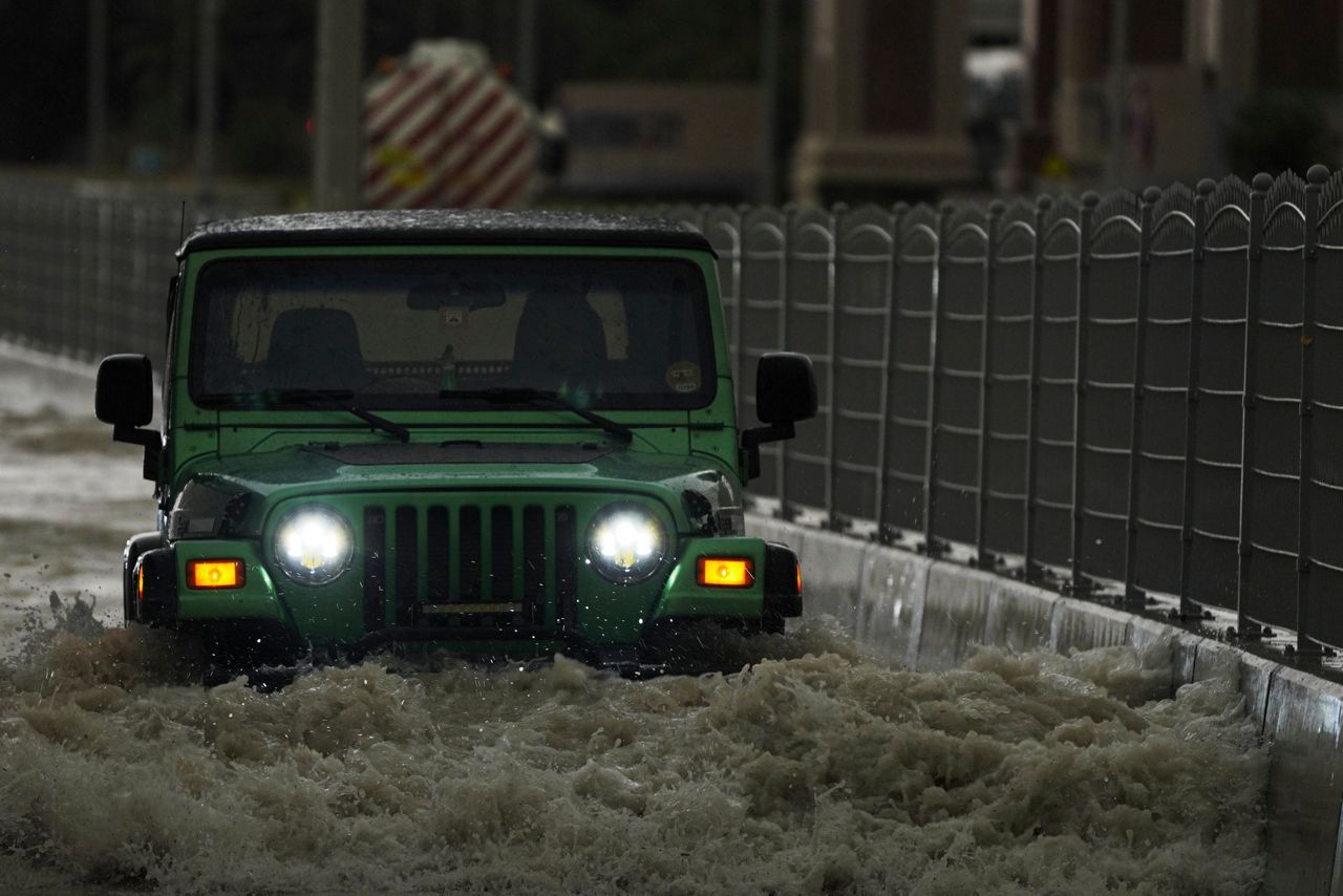 The desert nation of UAE records its most rain ever, flooding highways ...