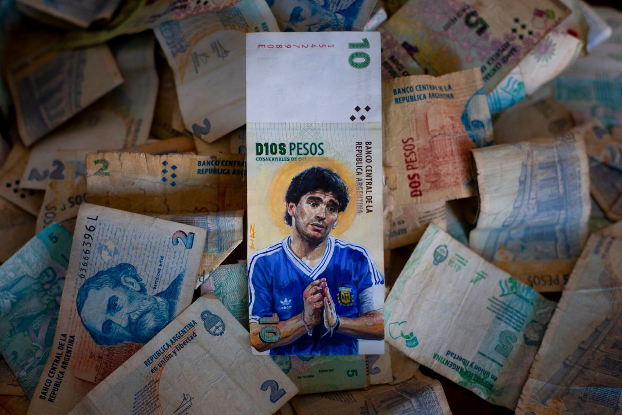 Paintings on pesos illustrate Argentina's currency and inflation woes