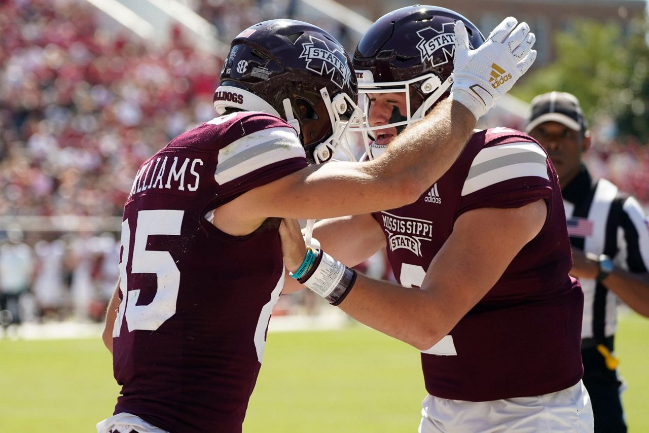 Rogers sets SEC passing record, No. 23 MSU beats Arkansas