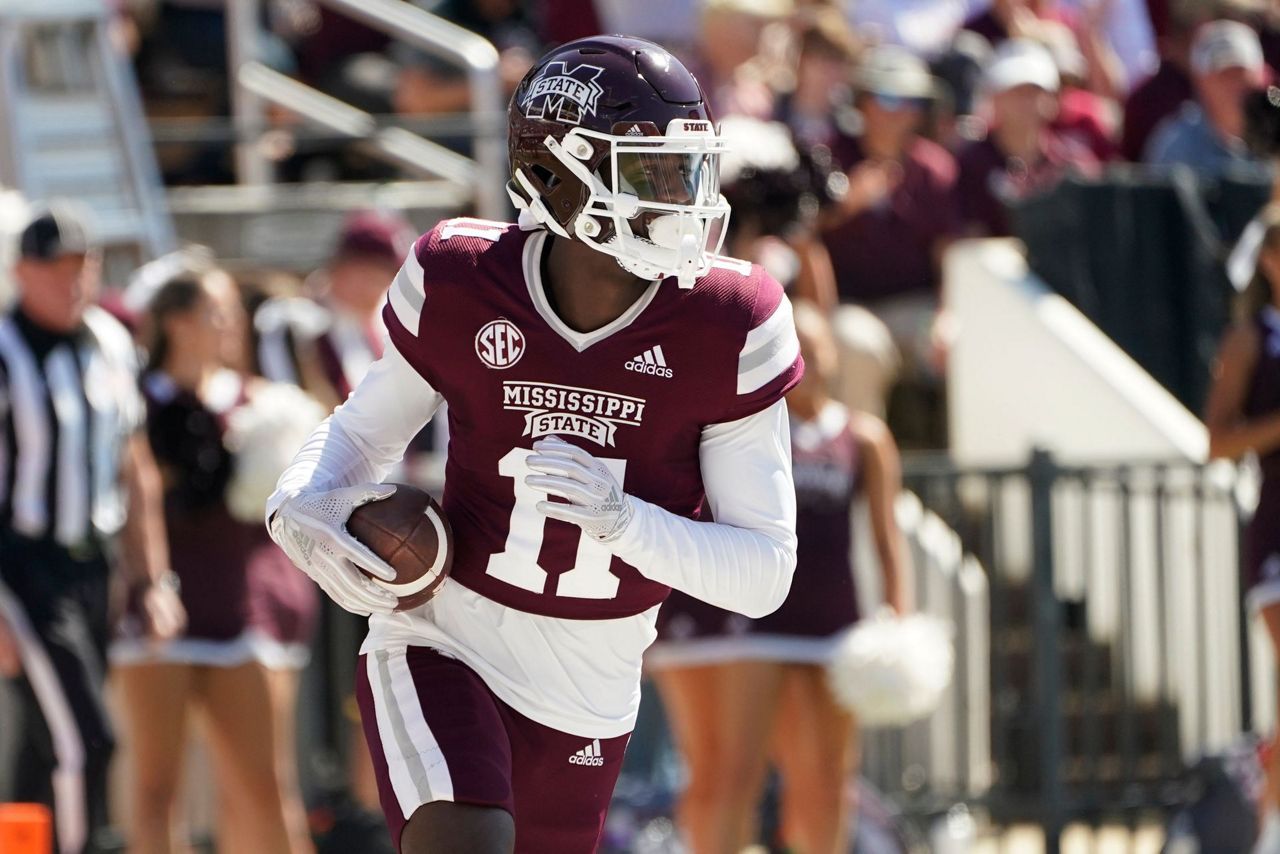 Rogers sets SEC passing record, No. 23 MSU beats Arkansas