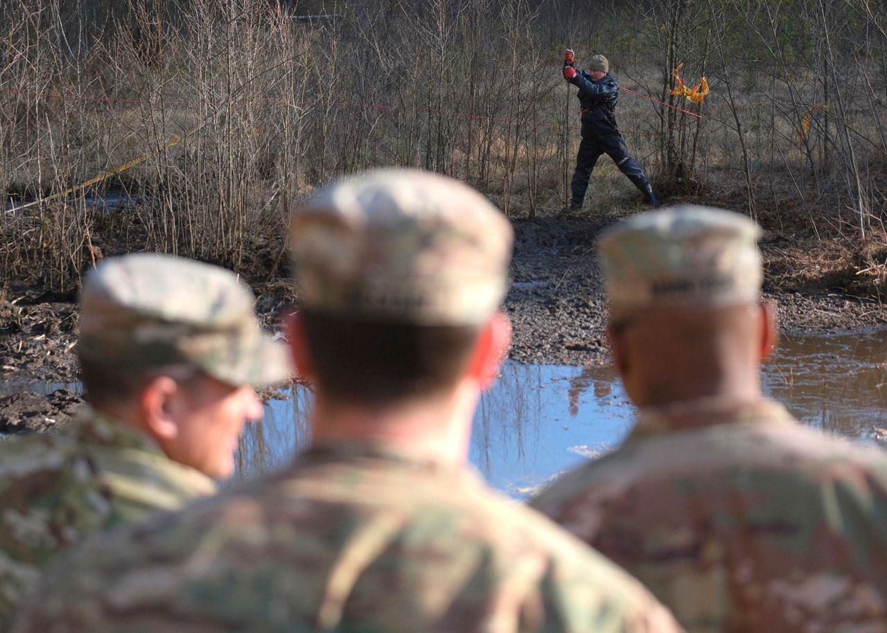 US and Lithuanian forces struggle to drain swamp to recover 4 soldiers ...