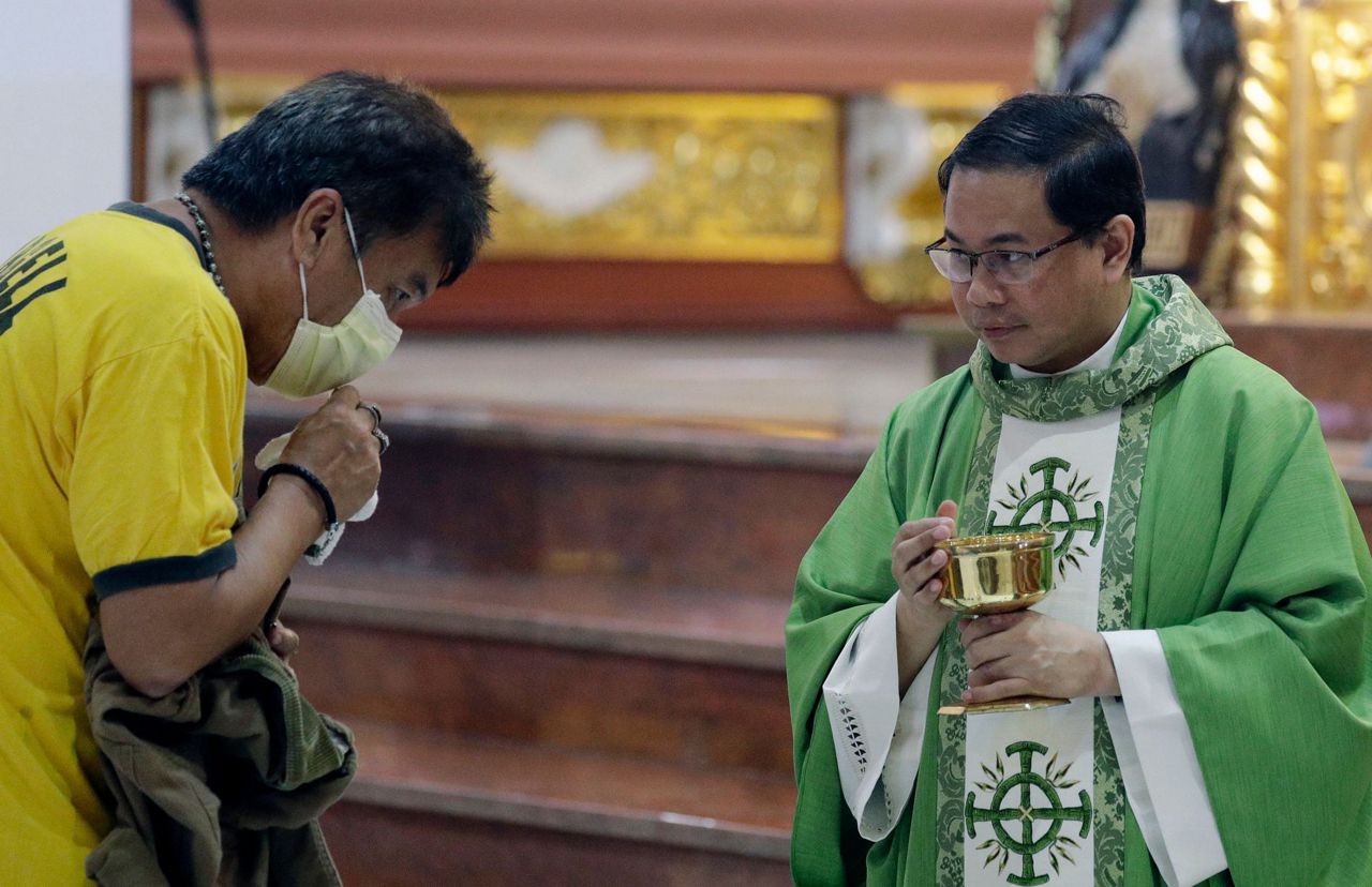 No handshakes: Viral outbreak spooks Asian places of worship