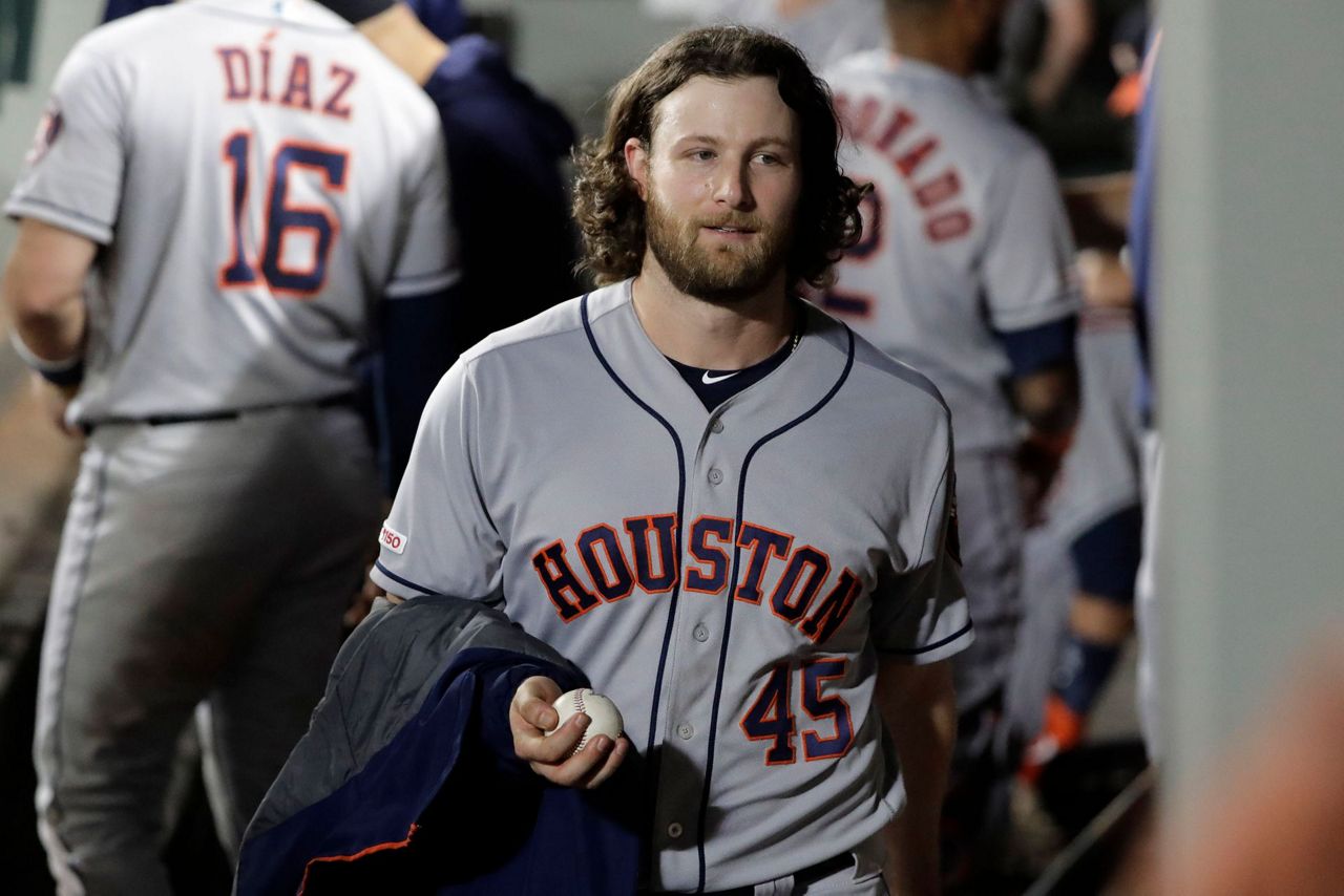 Cole wins 15th straight decision, Astros beat Mariners 3-0