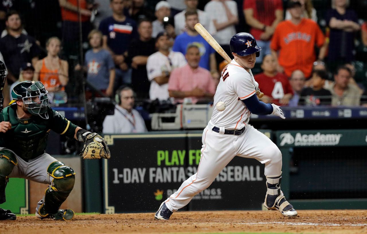 Astros beat A's 6-5 on bizarre play in 11th inning