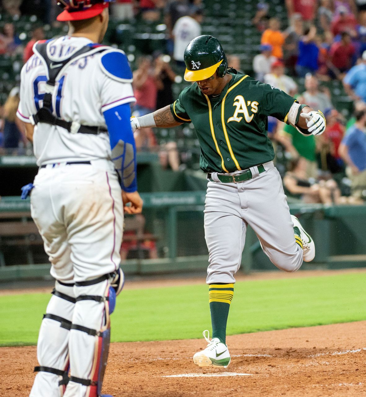 Davis hits 2 more HRs, A's rally again to beat Rangers 6-5