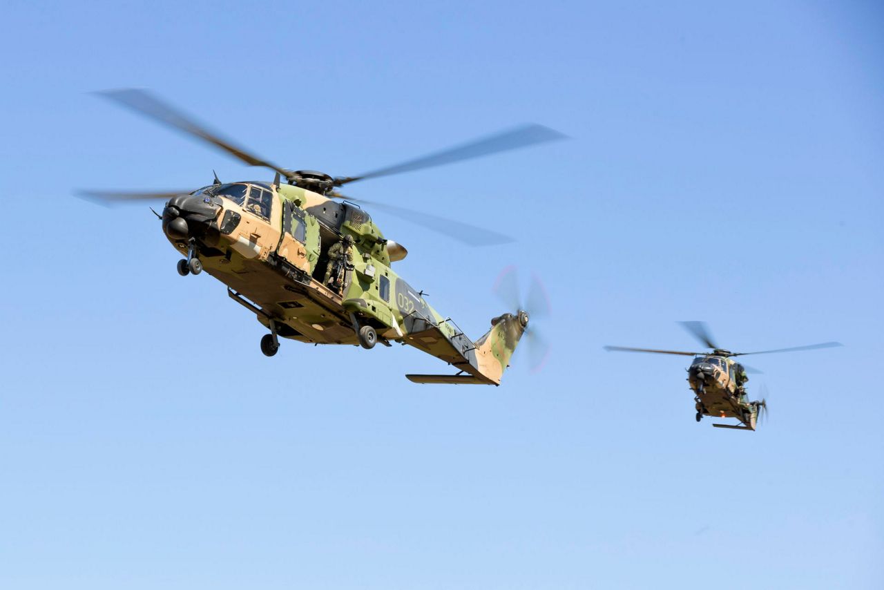 4 air crew members are missing after an Australian army helicopter ...