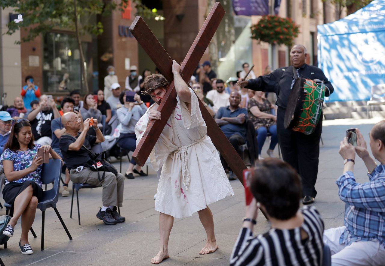 Christians mark Good Friday as holy sites gradually reopen