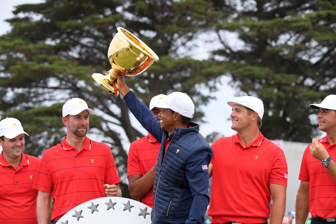 Tiger Woods caps comeback year by leading emotional team win