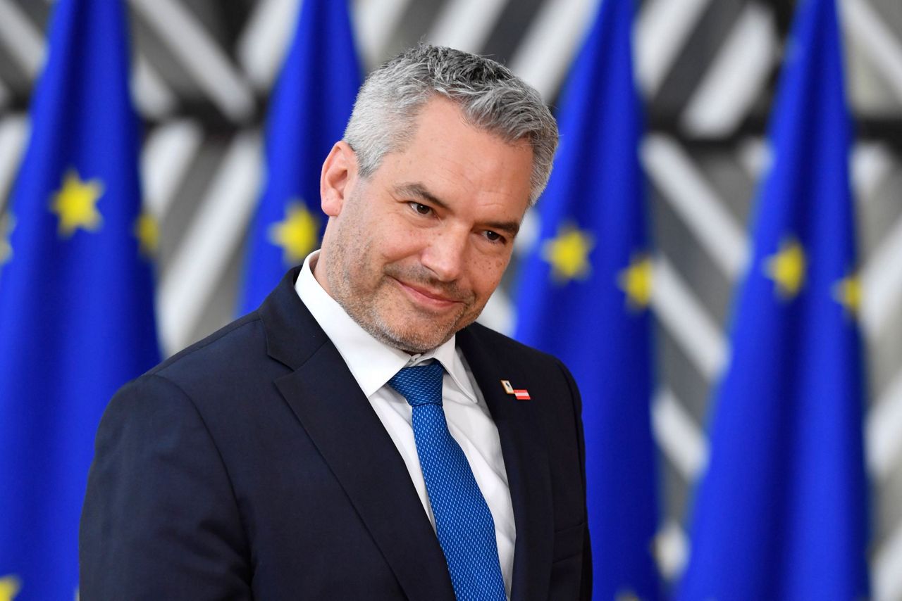 Neutral Austria under pressure to get tougher on Russia