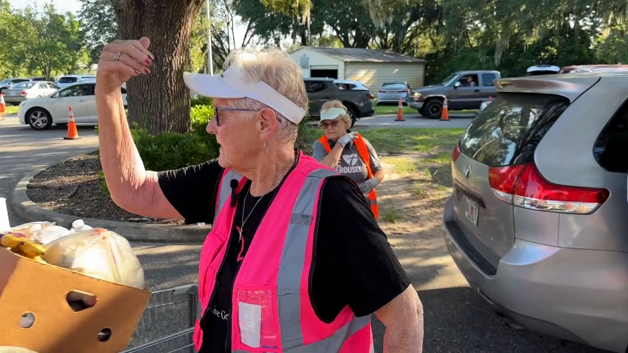 Volunteer Carla Haberland runs the Helping Hands Food Bank