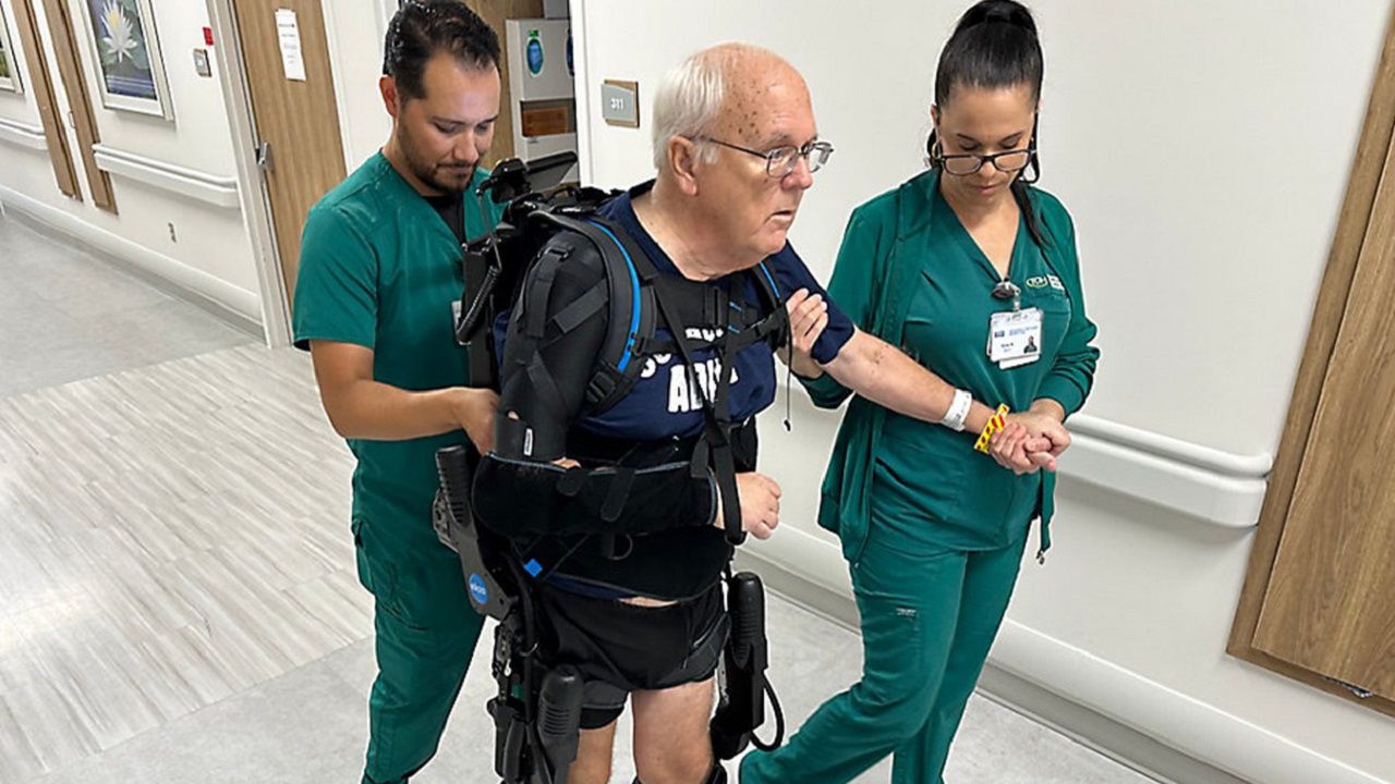 Robot-like exoskeleton helps Tampa stroke patient walk again