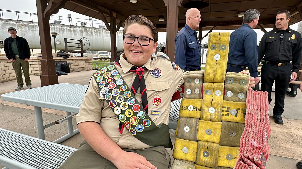 Boy Scout donates manikins to firefighters