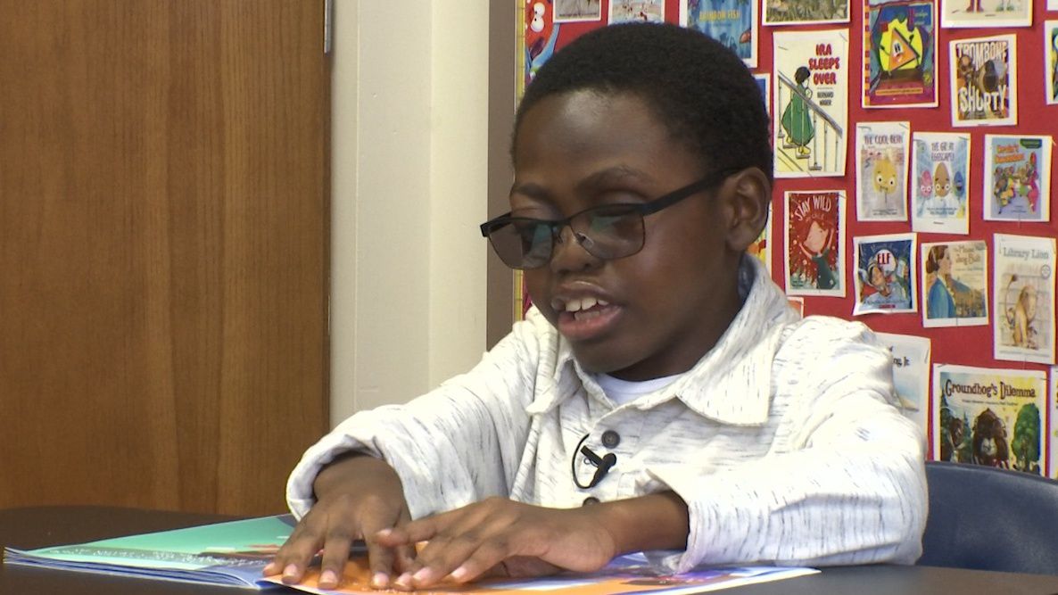 Young blind author creates his own superhero