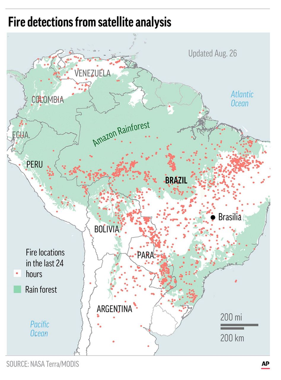 Brazilian firefighters toil in Amazon region hazy with smoke