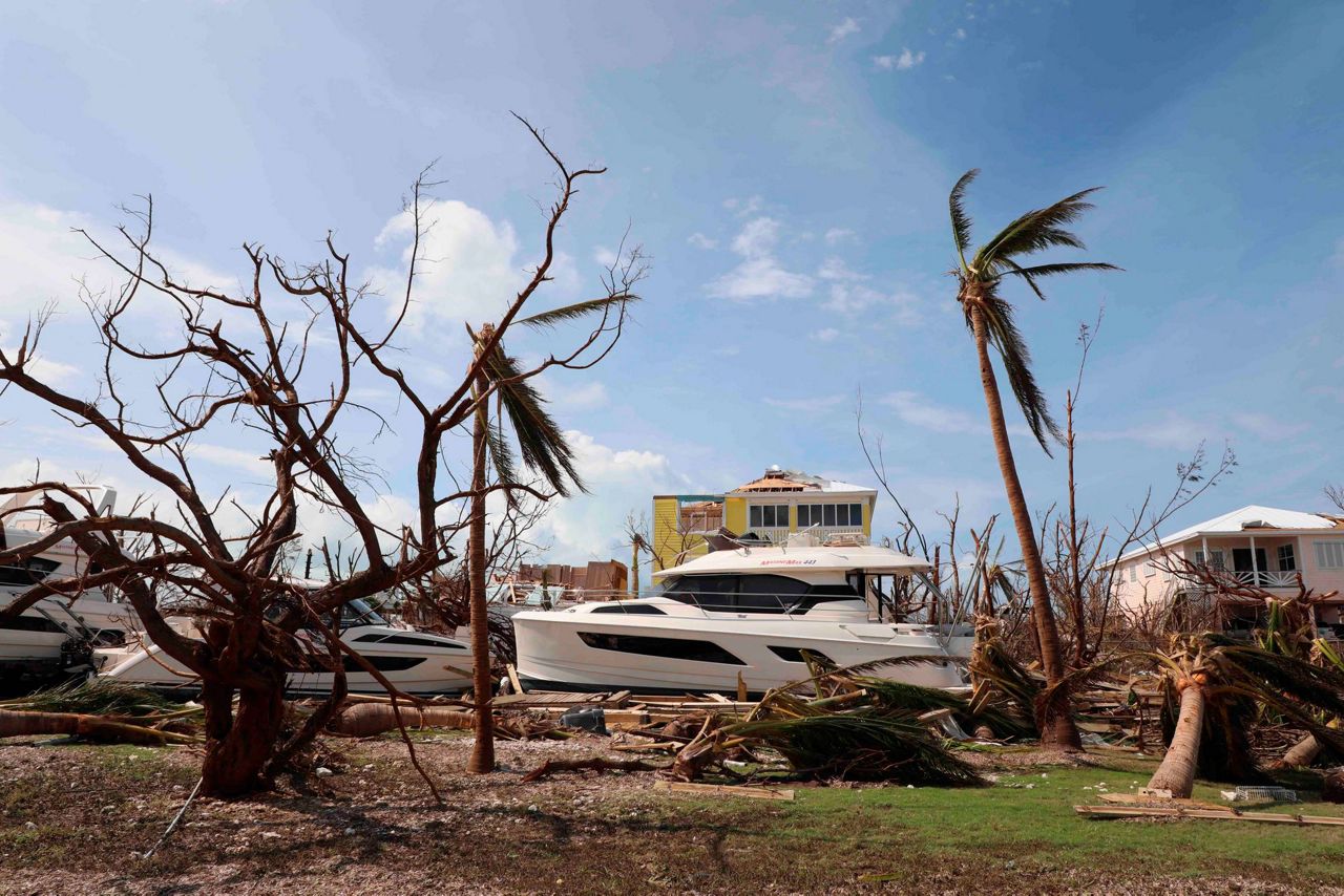 A rescue, a reunion and a rush to help in Dorian's aftermath