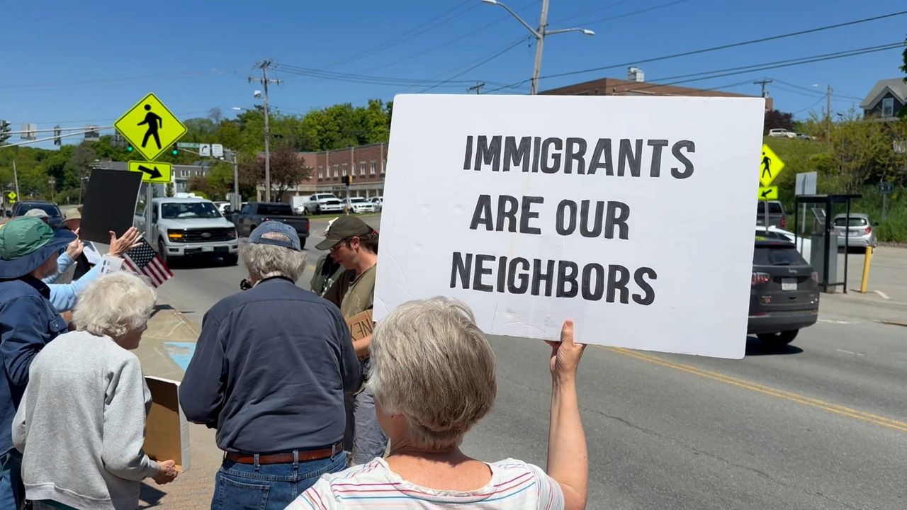 Protesters gather outside of federal building in Bangor