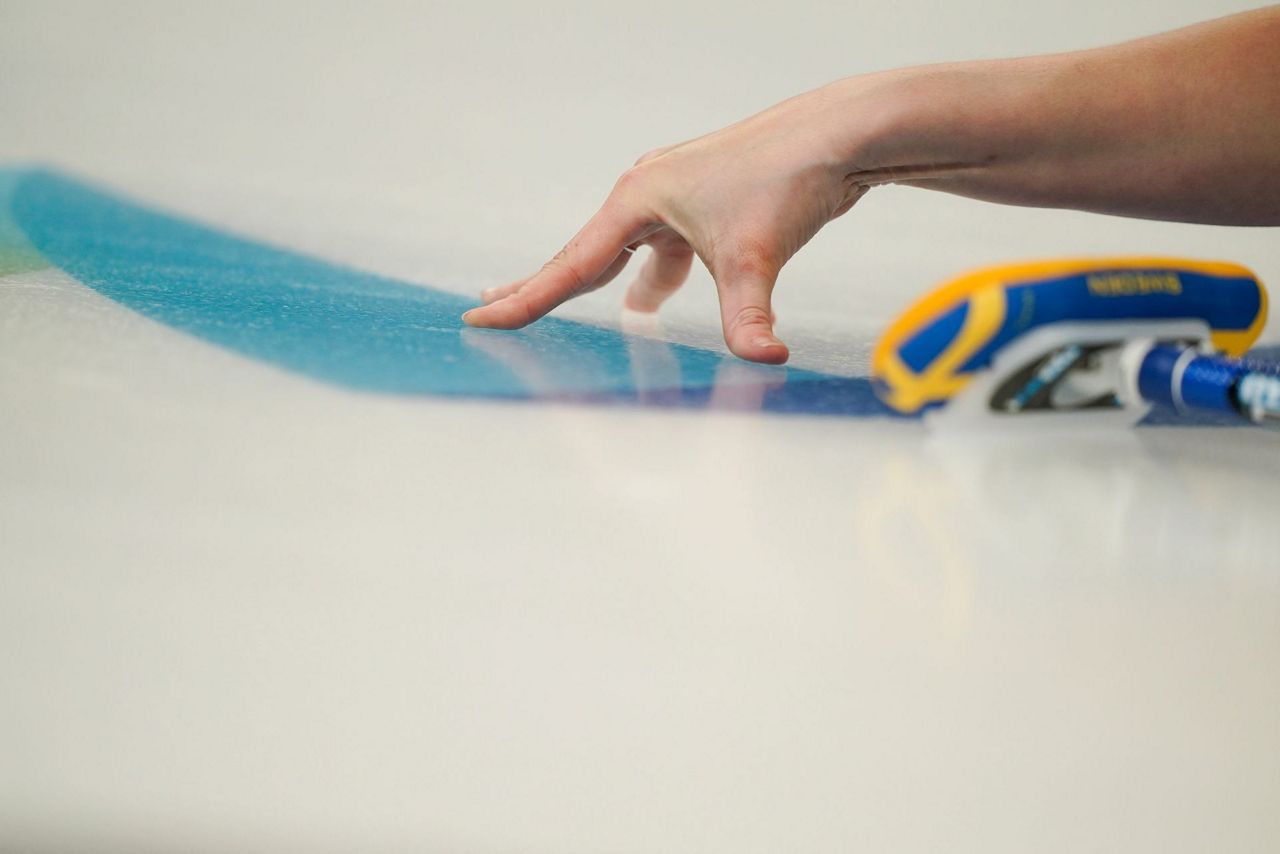 EXPLAINER: The meticulous path to ideal Olympic curling ice