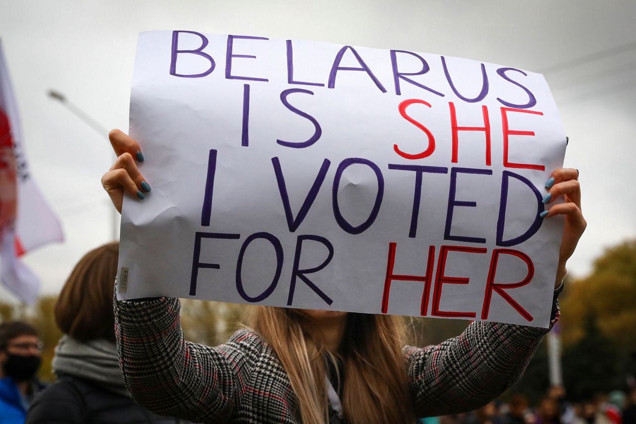 Belarusians vote in tightly controlled election amid opposition calls ...