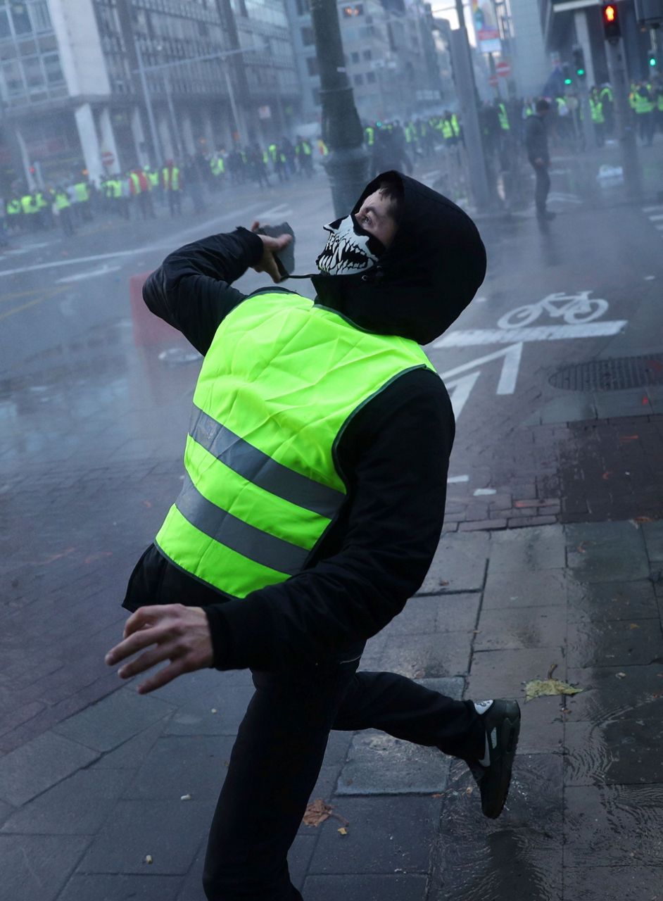 Brussels march mimics 'yellow jacket' France protests
