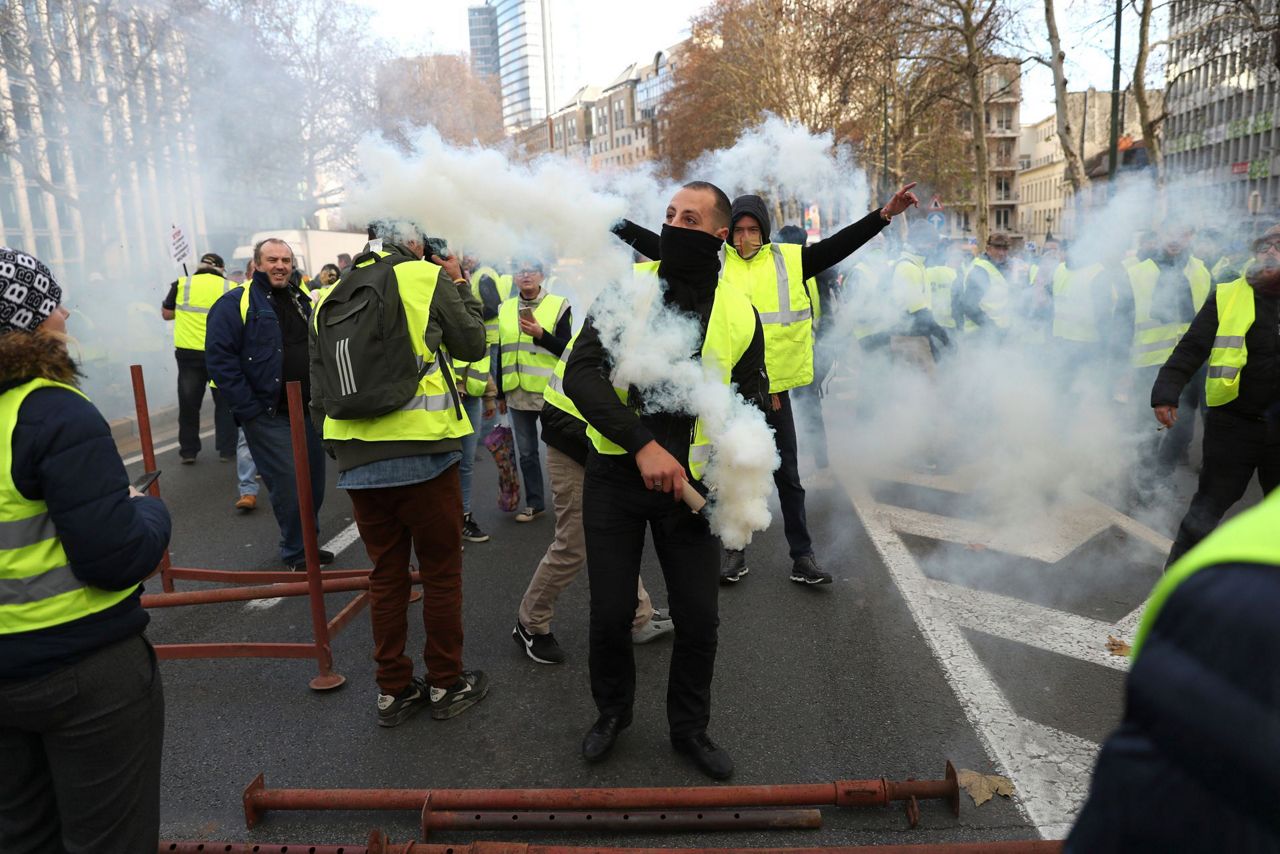 Brussels march mimics 'yellow jacket' France protests