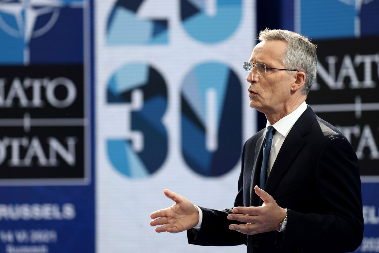 The Latest: NATO chief says it's time to set aside divisions