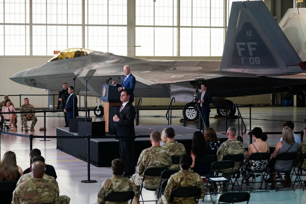 Biden starts holiday weekend by marking progress on virus