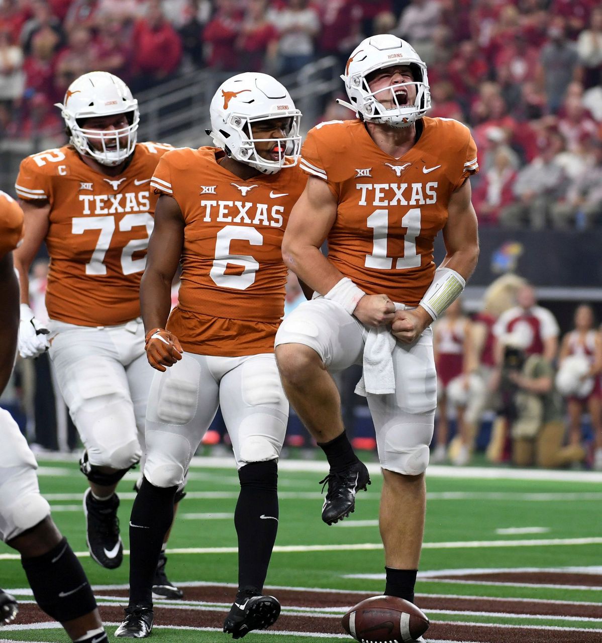 The Latest: Championship Saturday starts with Texas TD