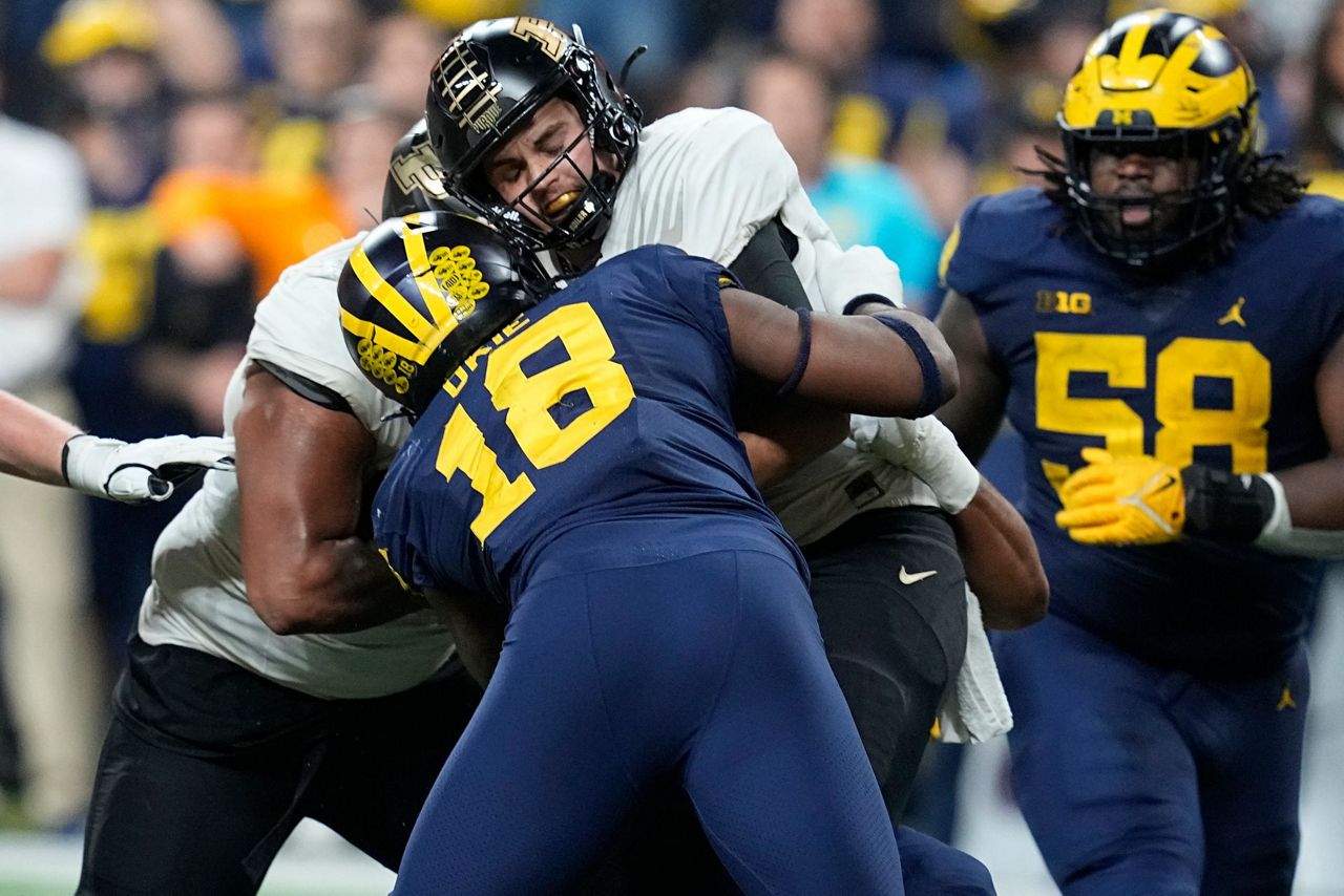 No. 2 Michigan beats Purdue 43-22 for Big Ten crown