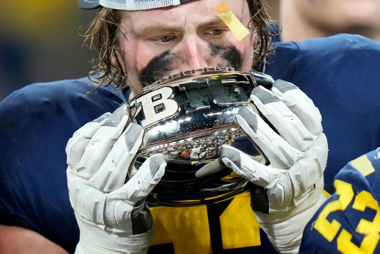 No. 2 Michigan beats Purdue 43-22 for Big Ten crown