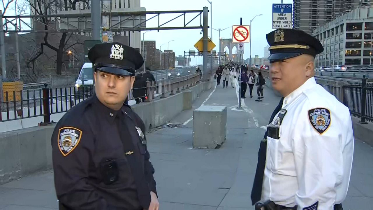 Officers save woman in crisis atop Brooklyn Bridge