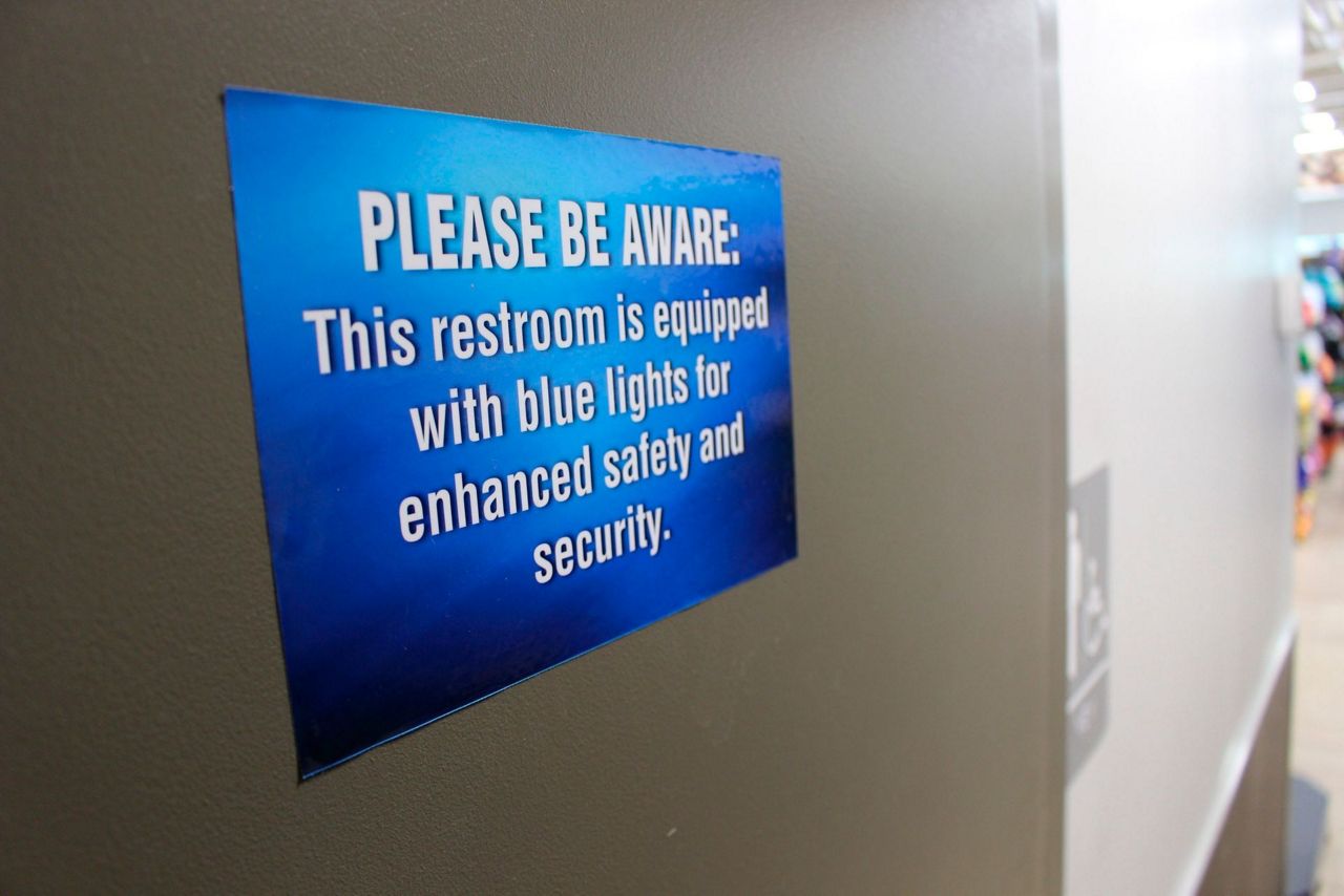 Retailers experiment with blue lights to deter drug use