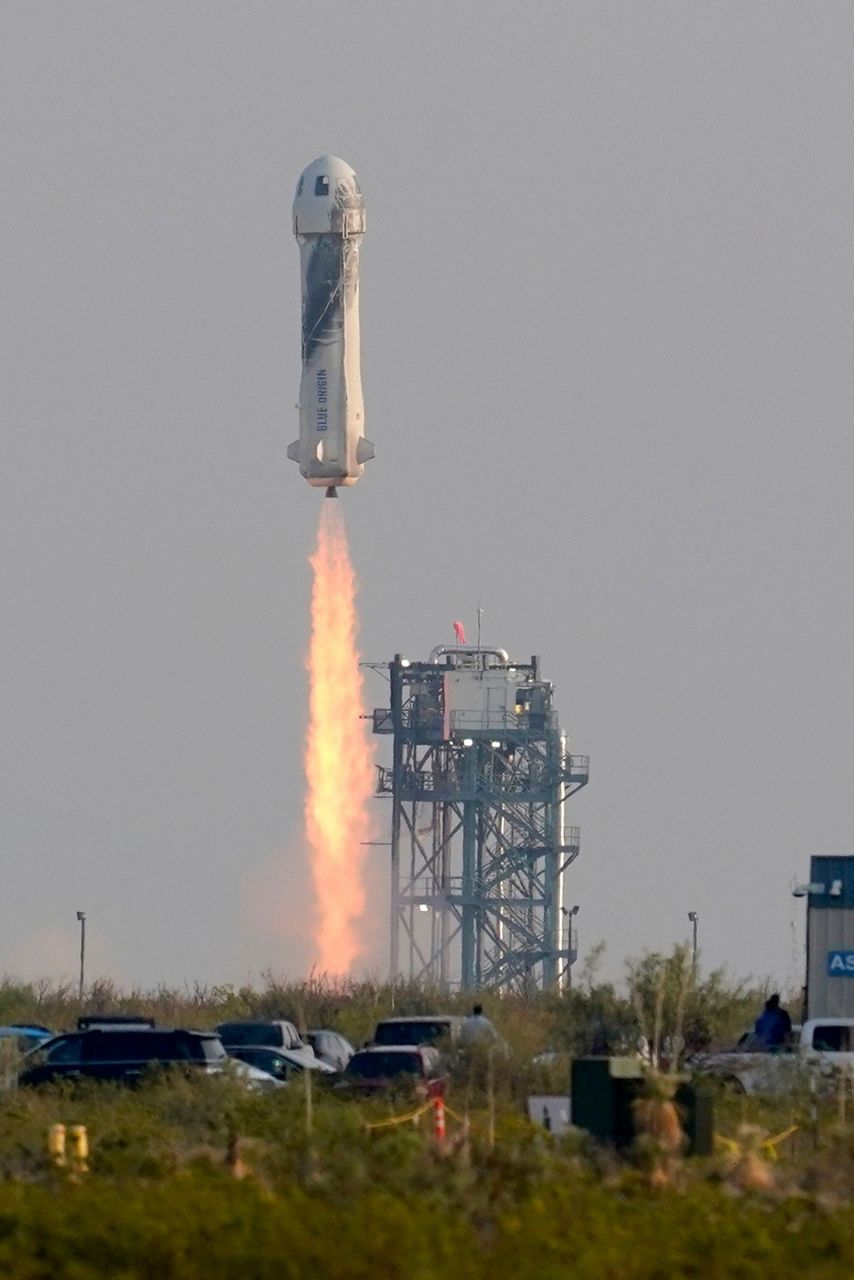 Bezos riding own rocket on company's 1st flight with people