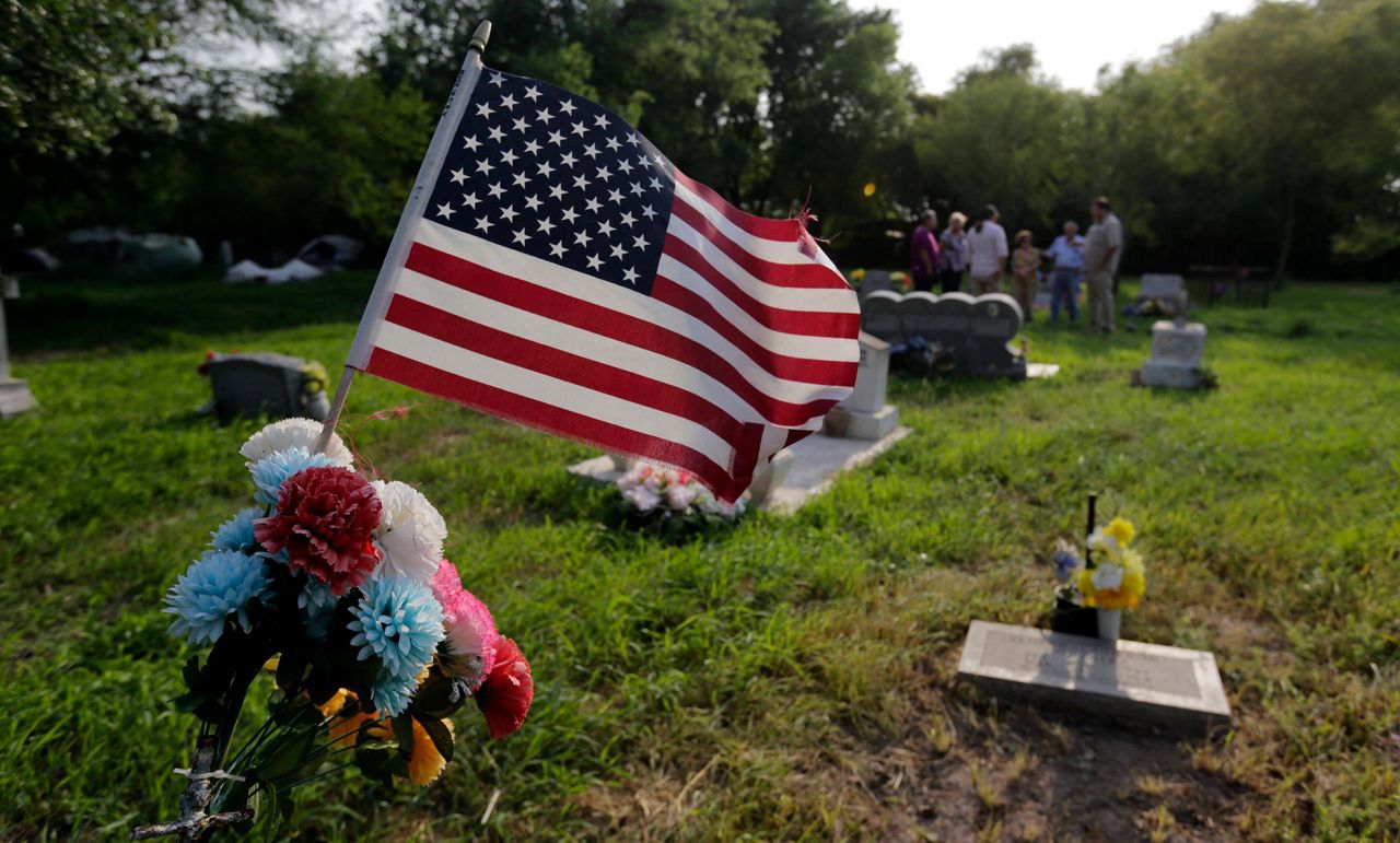 Cemeteries and family memories stand in border wall's way