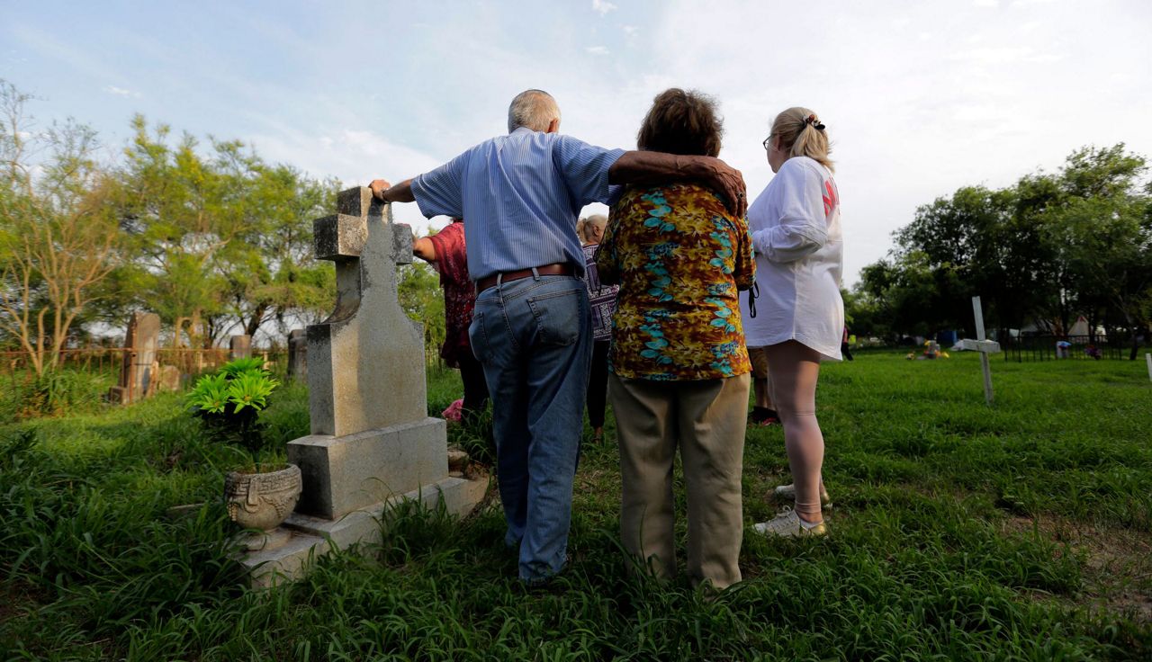 Cemeteries and family memories stand in border wall's way