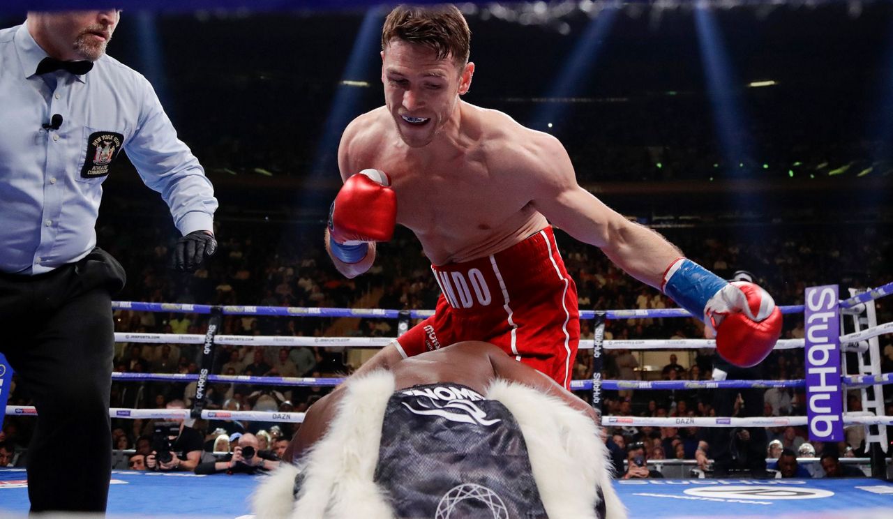 AP Interview: Smith looks for family revenge against Alvarez