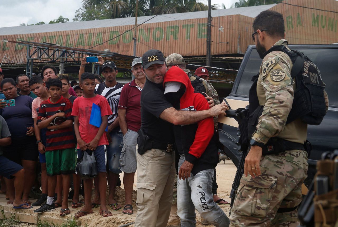 Brazil's police take suspect to area of search for 2 missing