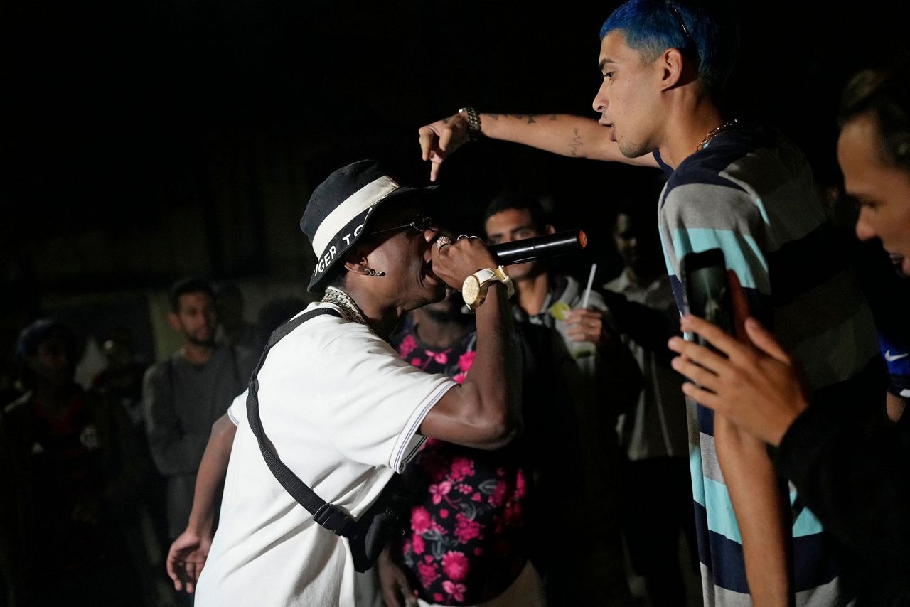 In Brazil favela, rap battle is sign of returning normality