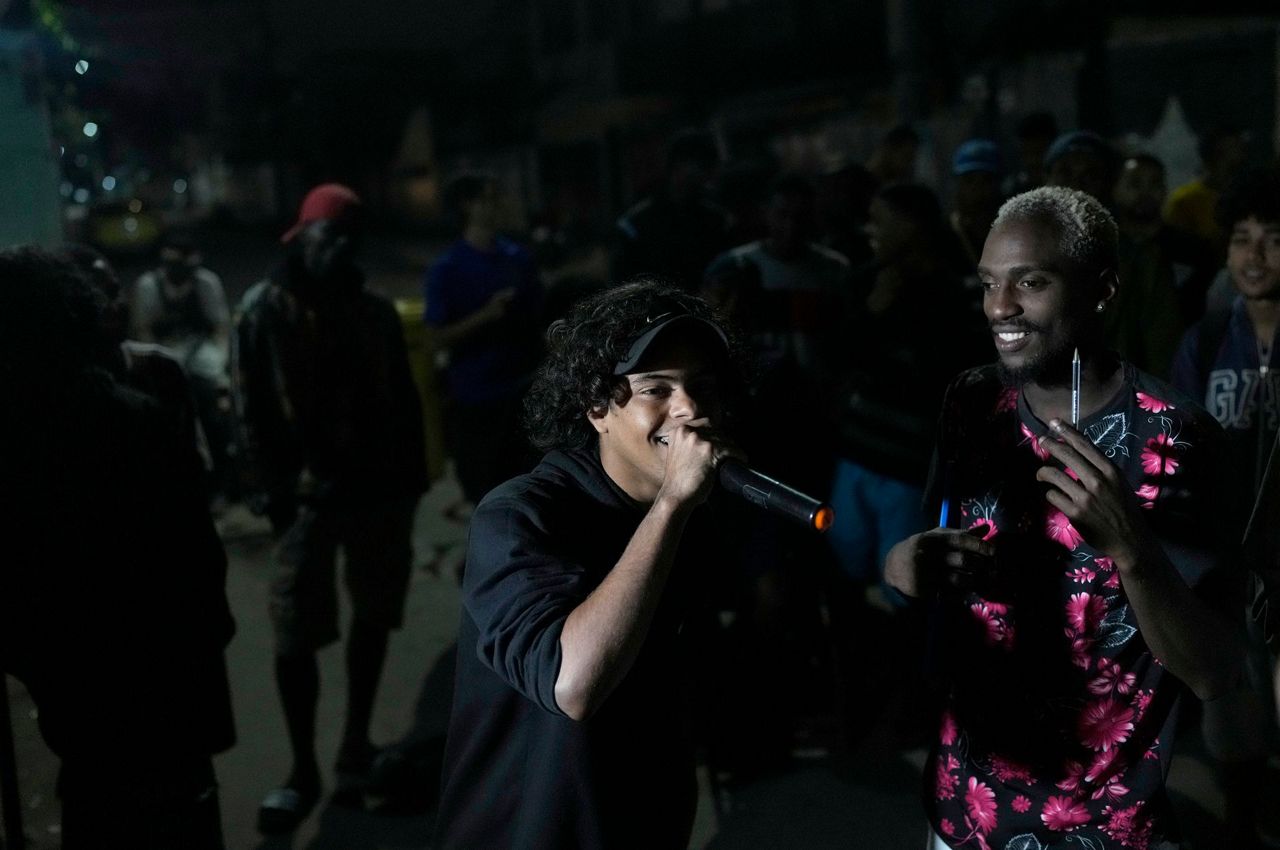 In Brazil favela, rap battle is sign of returning normality