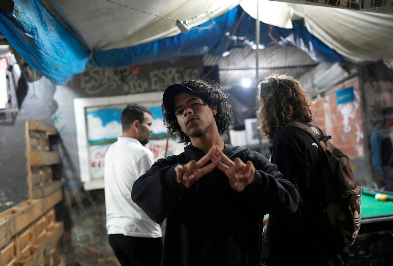 In Brazil favela, rap battle is sign of returning normality