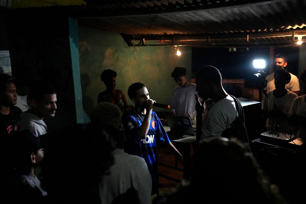 In Brazil favela, rap battle is sign of returning normality