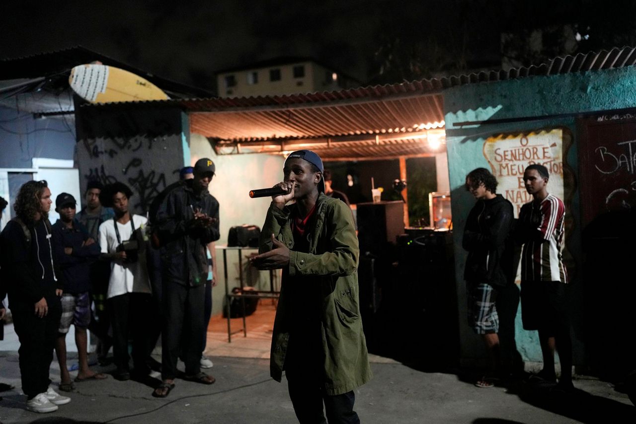 In Brazil favela, rap battle is sign of returning normality