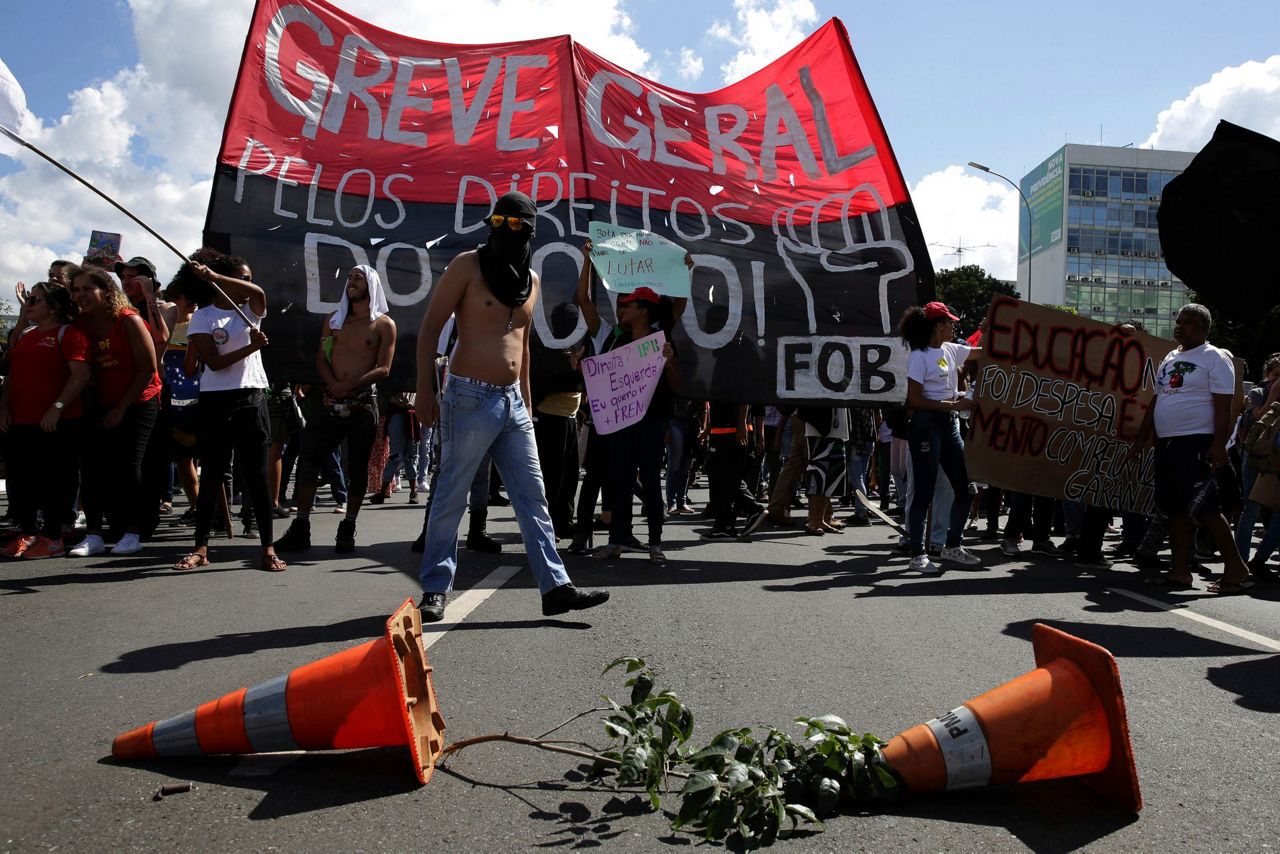 Crowds protest cuts in federal funding for Brazil schools