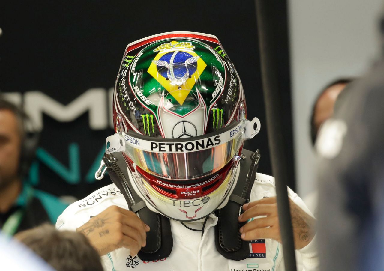 Hamilton unveils new Senna tribute helmet at Brazilian GP